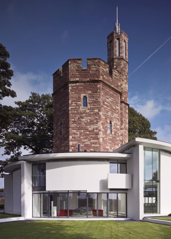 Modern Home Built Around a Historic Tower - InsideHook