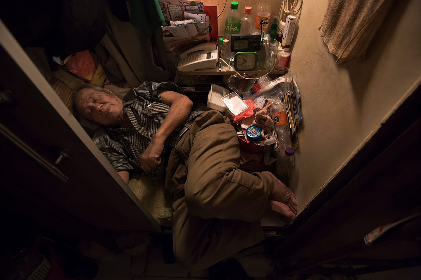 Exploring the Tiny 'Coffin Homes' Of Hong Kong - InsideHook