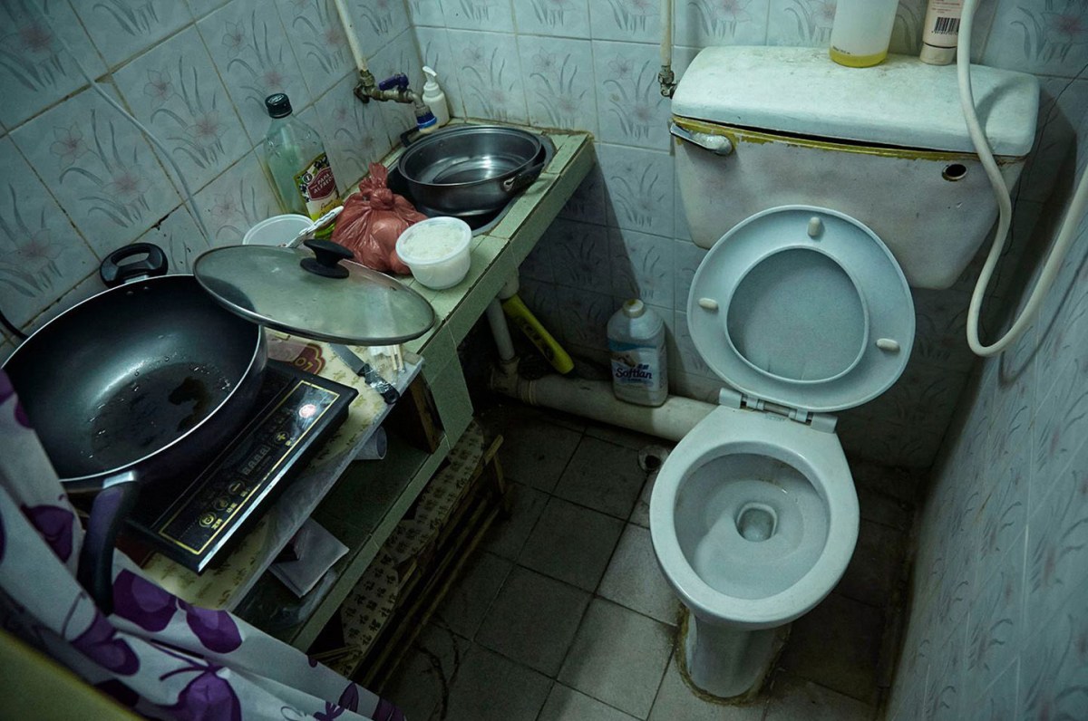 Exploring the Tiny 'Coffin Homes' Of Hong Kong - InsideHook