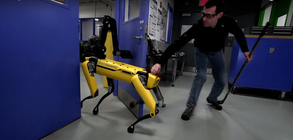 Watch This Human Battle the Door-Opening Robot Dog - InsideHook
