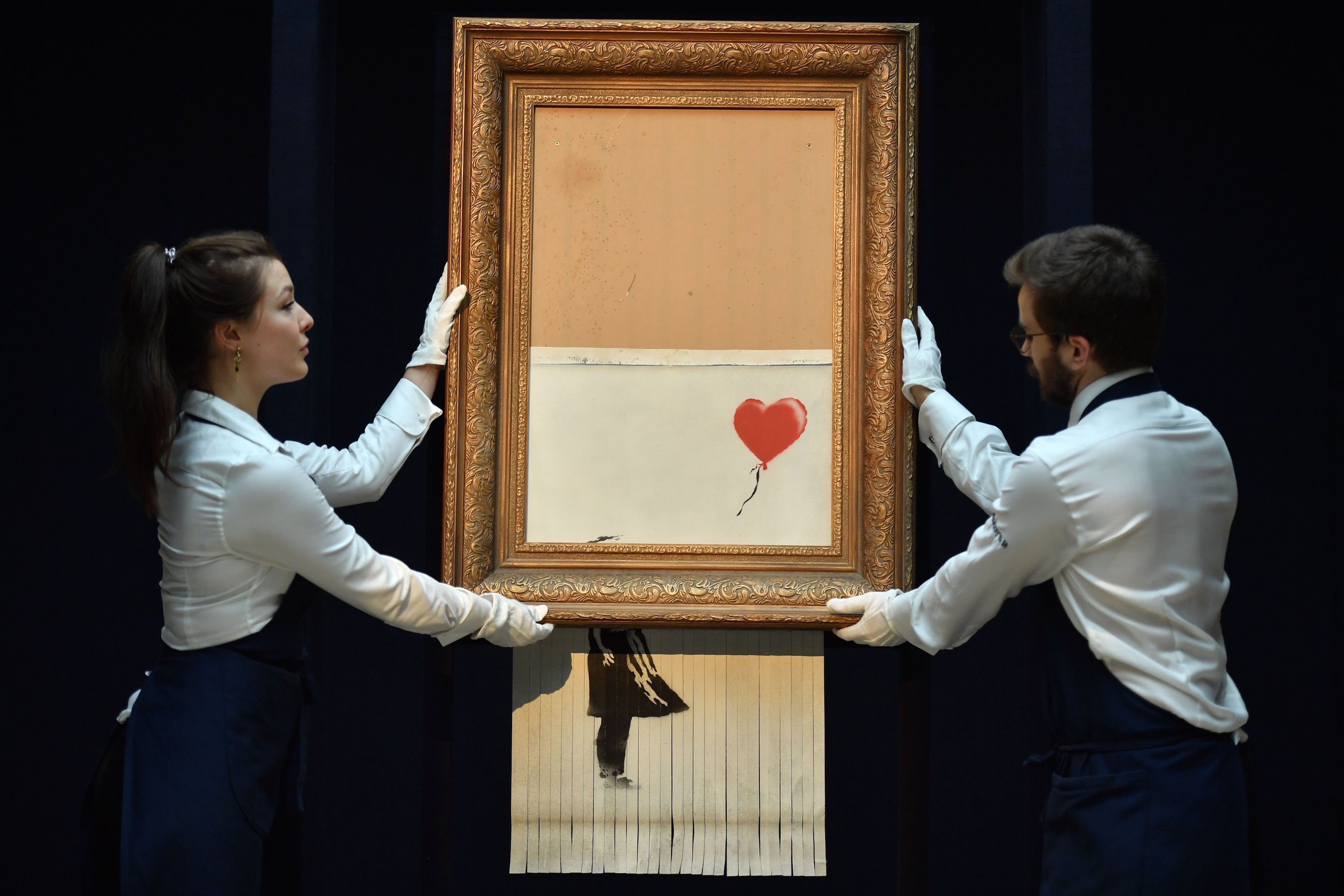 The Shredded Banksy Artwork Is Now Named "Love is in the Bin" - InsideHook