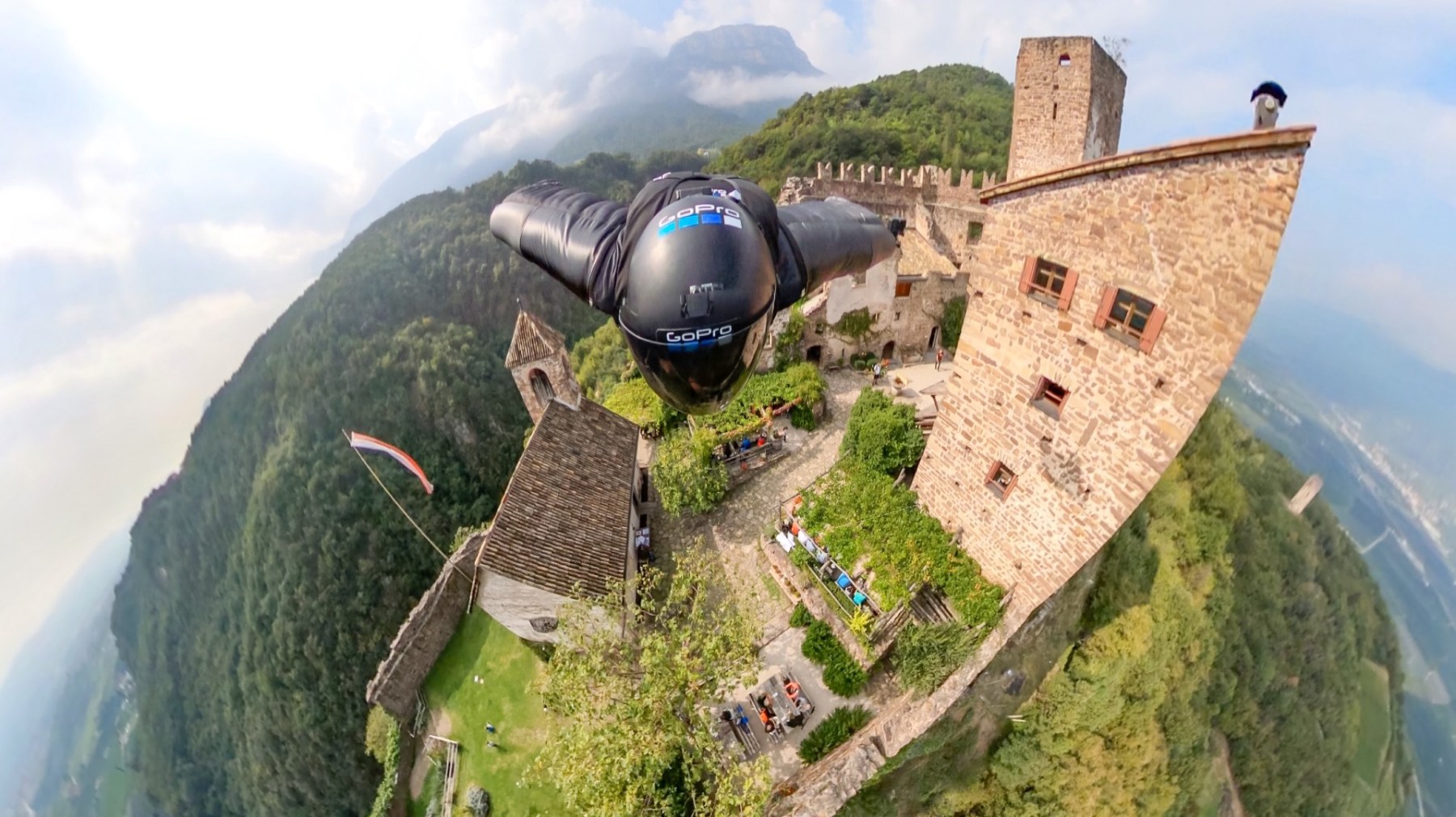 Flying A Wingsuit Through The Crack In Switzerland - InsideHook