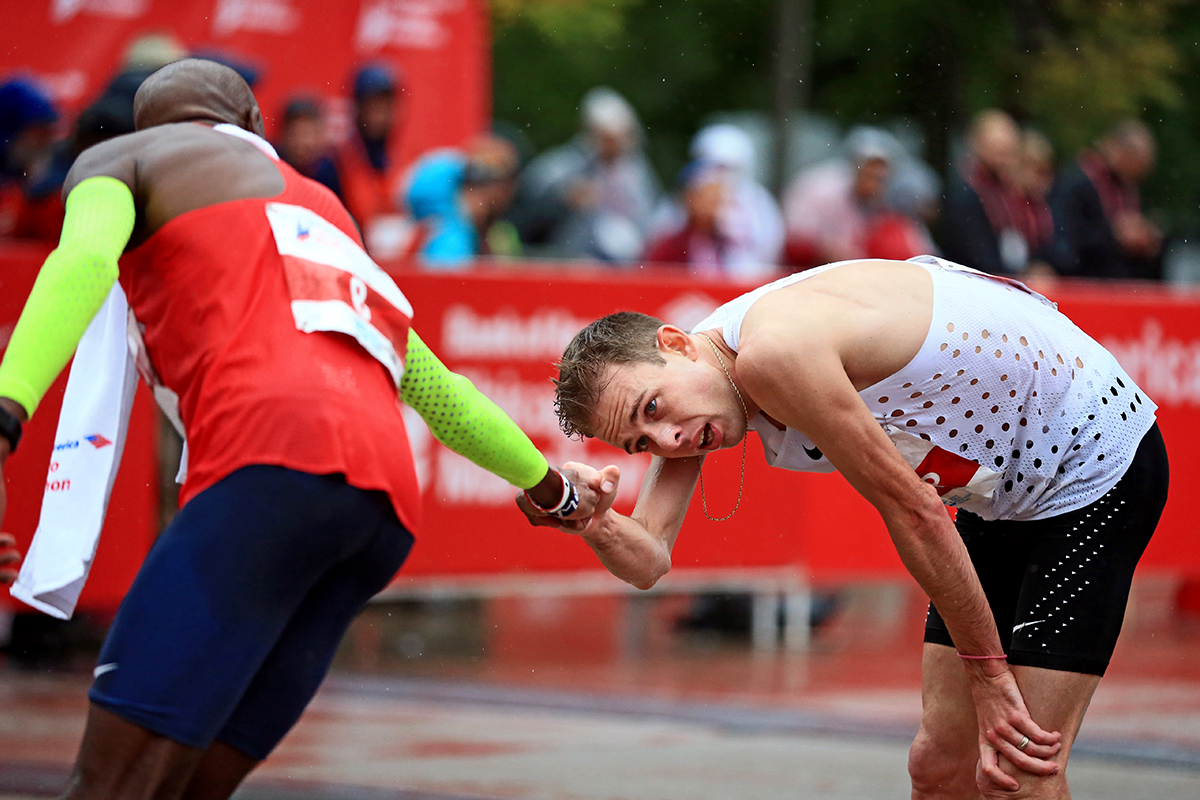 Why Do Pro Runners Wear Chains in Races? - InsideHook