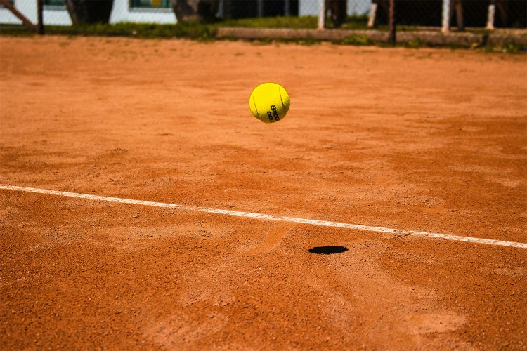 What Is the Point of Running With a Tennis Ball - InsideHook