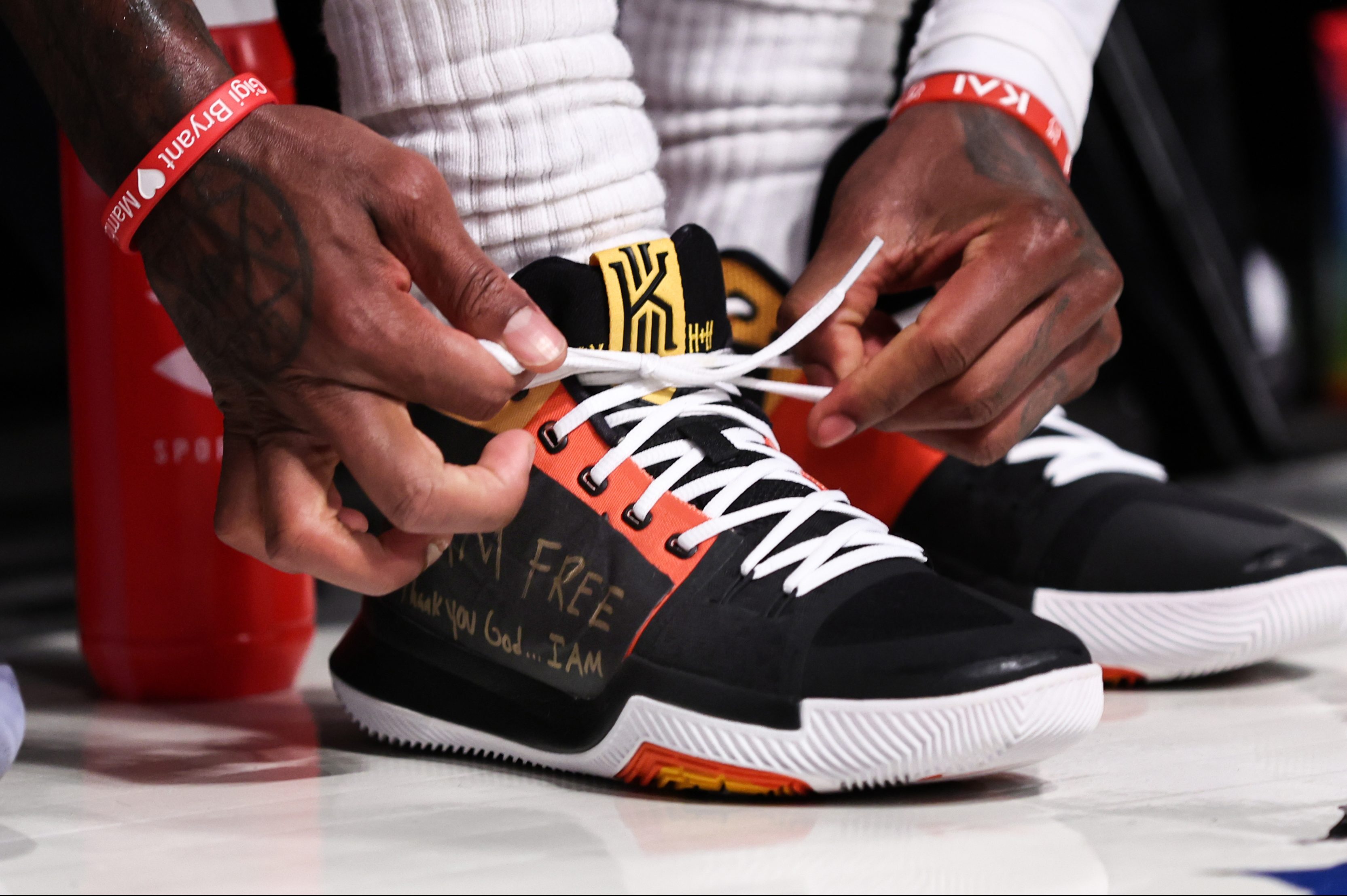 "Free" From Nike Deal, Kyrie Irving Plays in Taped-Over Sneakers ...