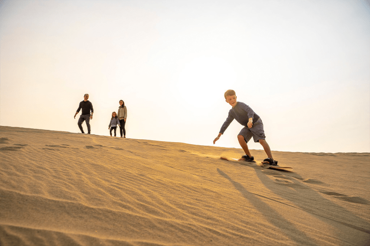 Learning Sand Surfing at the Base of the Wind River Mountains - InsideHook