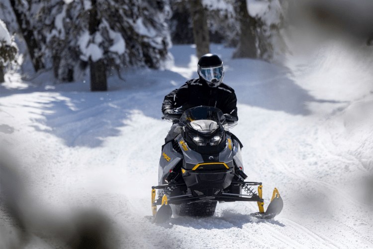 The Best Way to See Yellowstone Is From a Snowmobile - InsideHook
