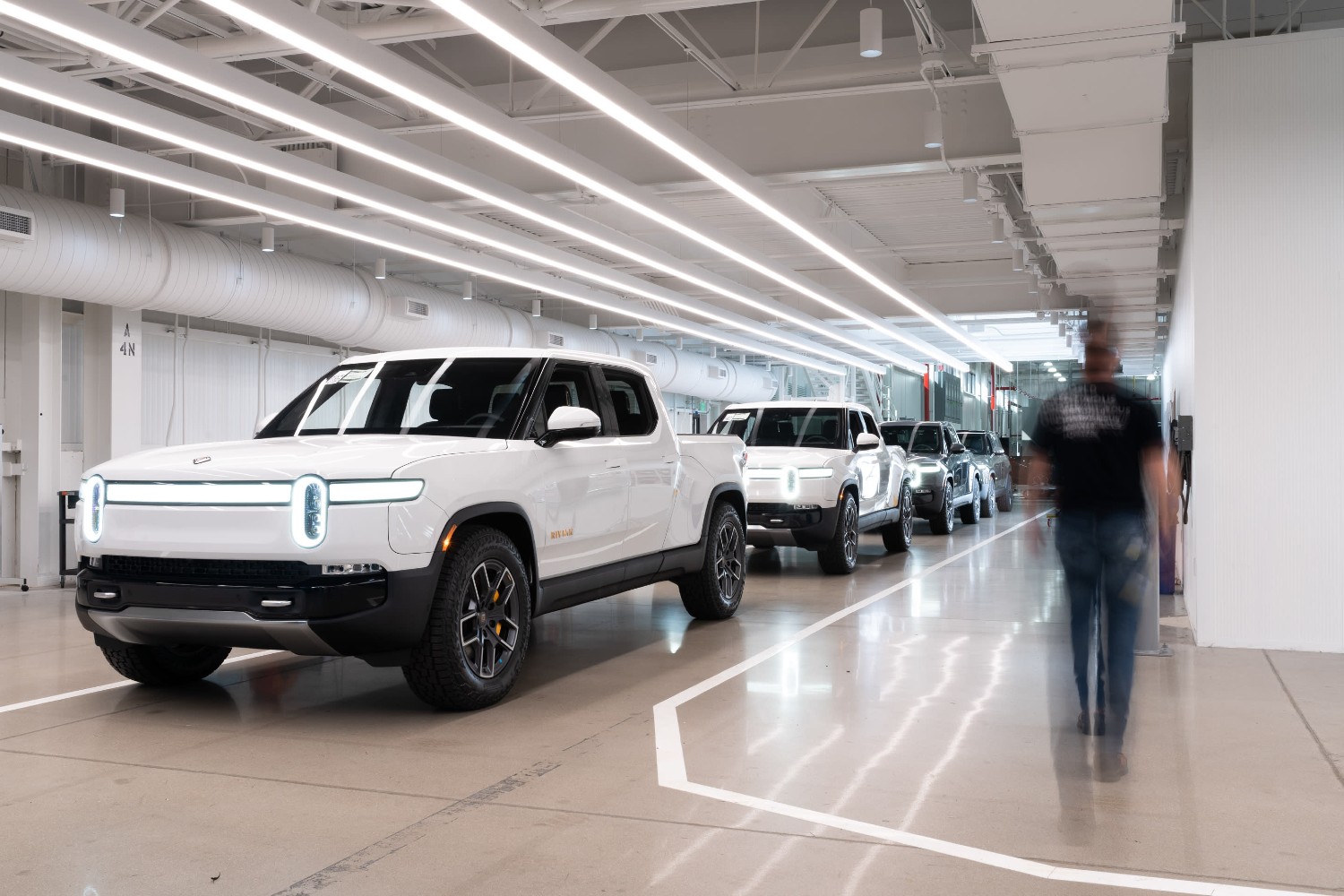 Is Rivian's Billion-Dollar Federal Loan at Risk? - InsideHook